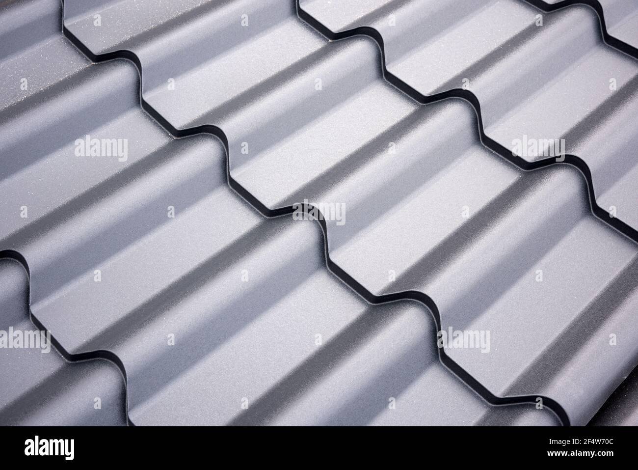 Metal roof construction. Background of building materials close-up ...