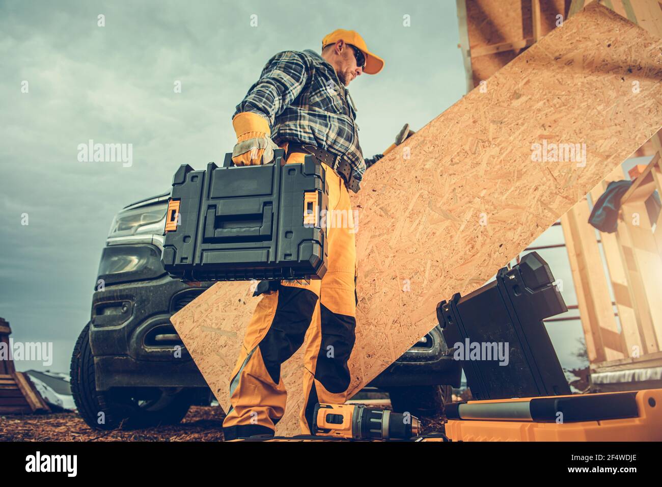 Caucasian Construction Worker in his 40s Moving His Tools Inside ...
