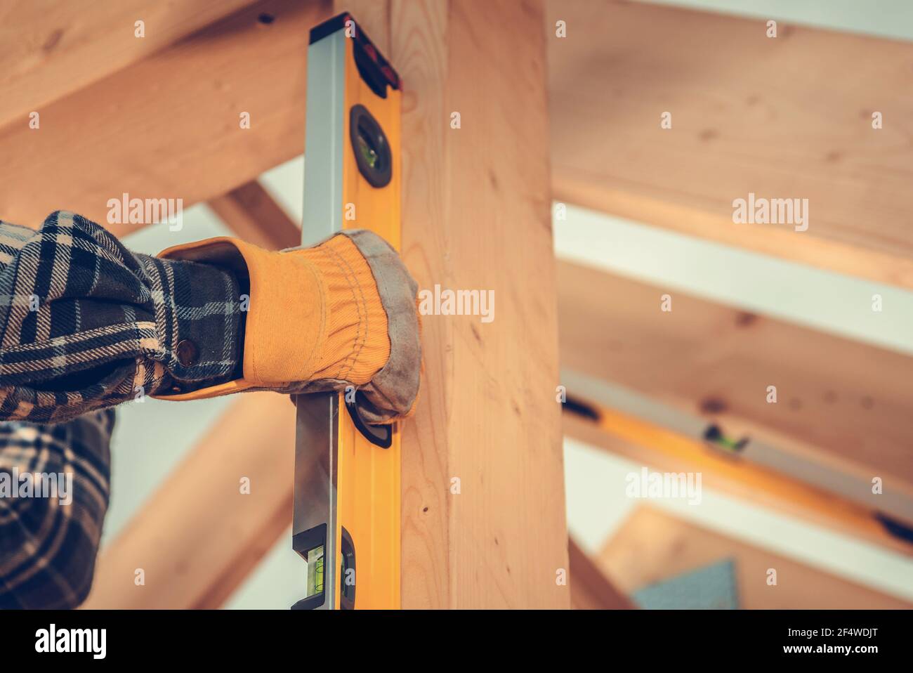 Industrial Theme. Construction Contractor Checking Home Frame Levels ...