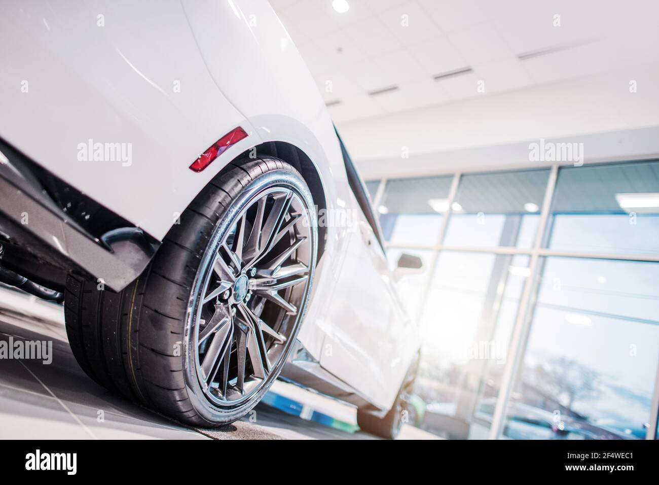 Modern Brand New Luxury Sports Vehicle Inside Dealership Showroom ...