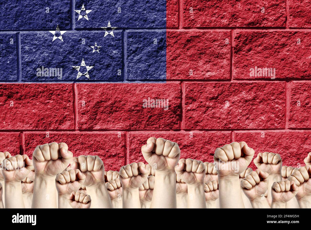 Raised fists against the background of the depicted flag of Samoa on a ...