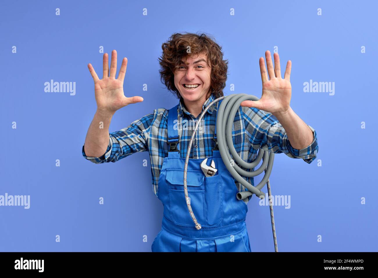 optimistic plumber man welcoming clients waving hand at camera isolated ...