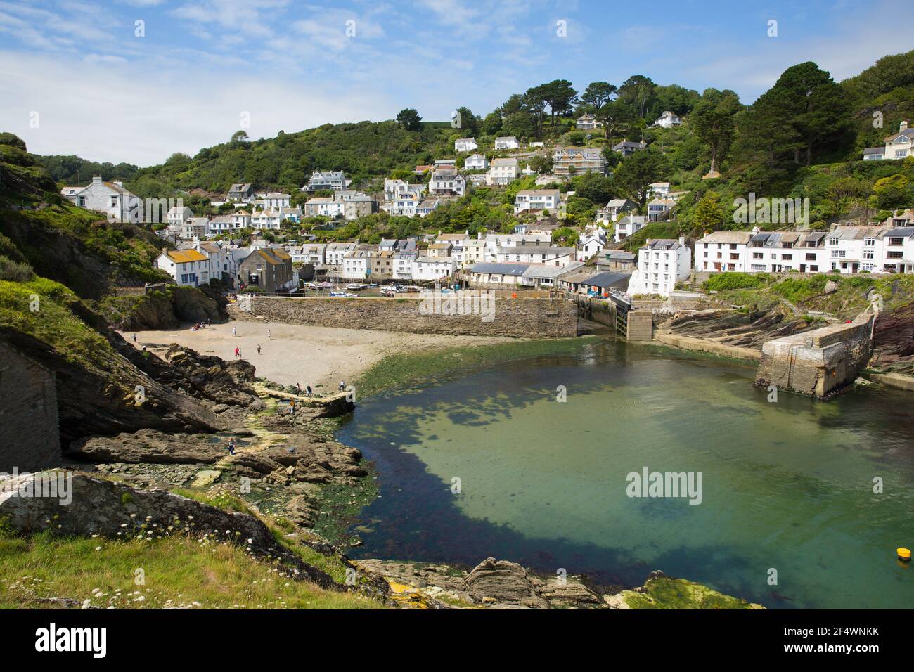 Polperro Cornwall England clear blue sea stunning harbour scene Stock ...