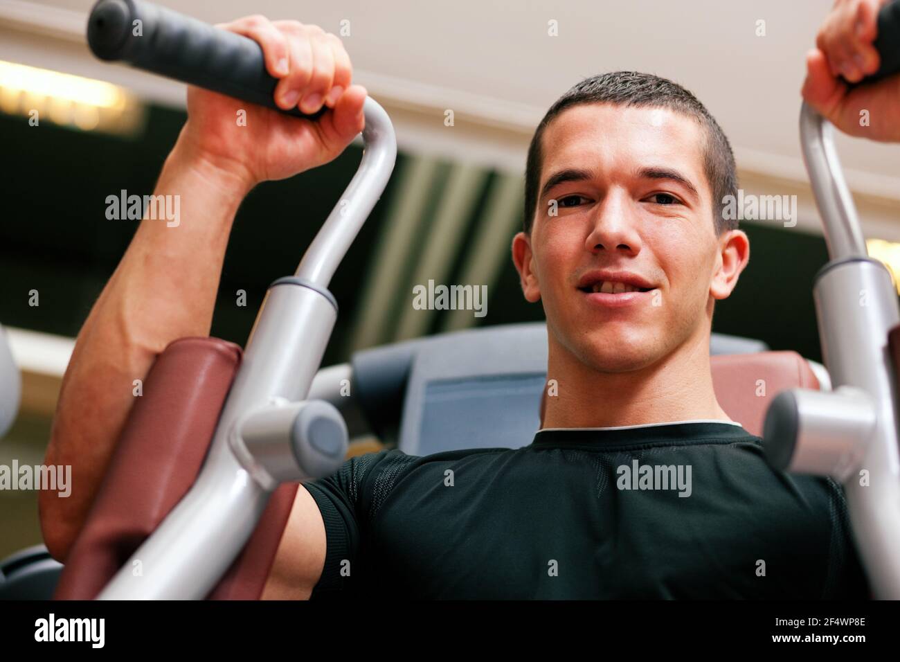 Woman does outdoor stretching with her personal trainer on a great ...