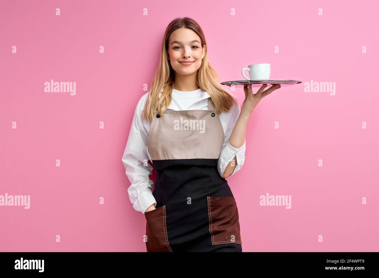 Nice woman waitress in apron hi-res stock photography and images - Alamy