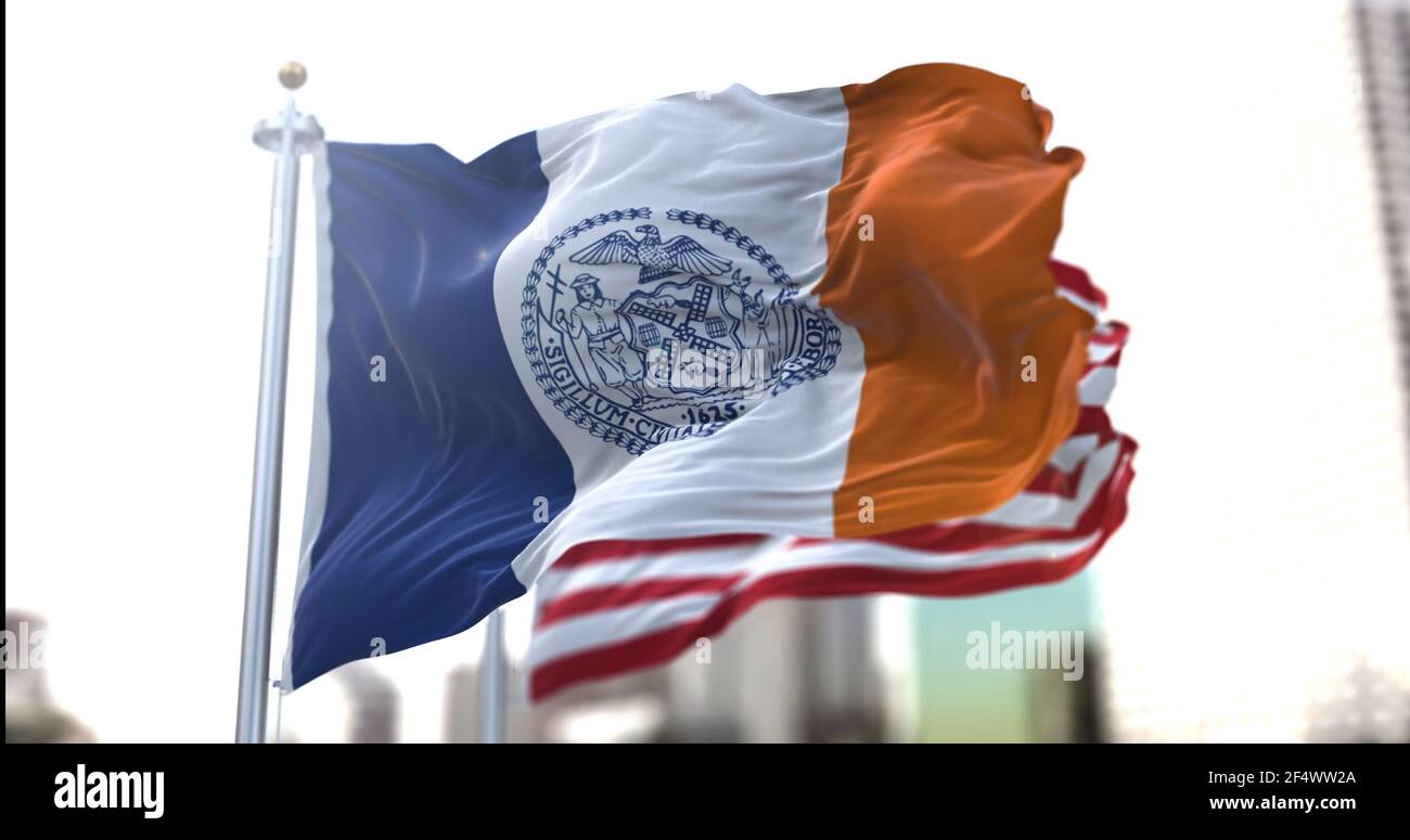 the official flag of New York City flapping along with the American ...