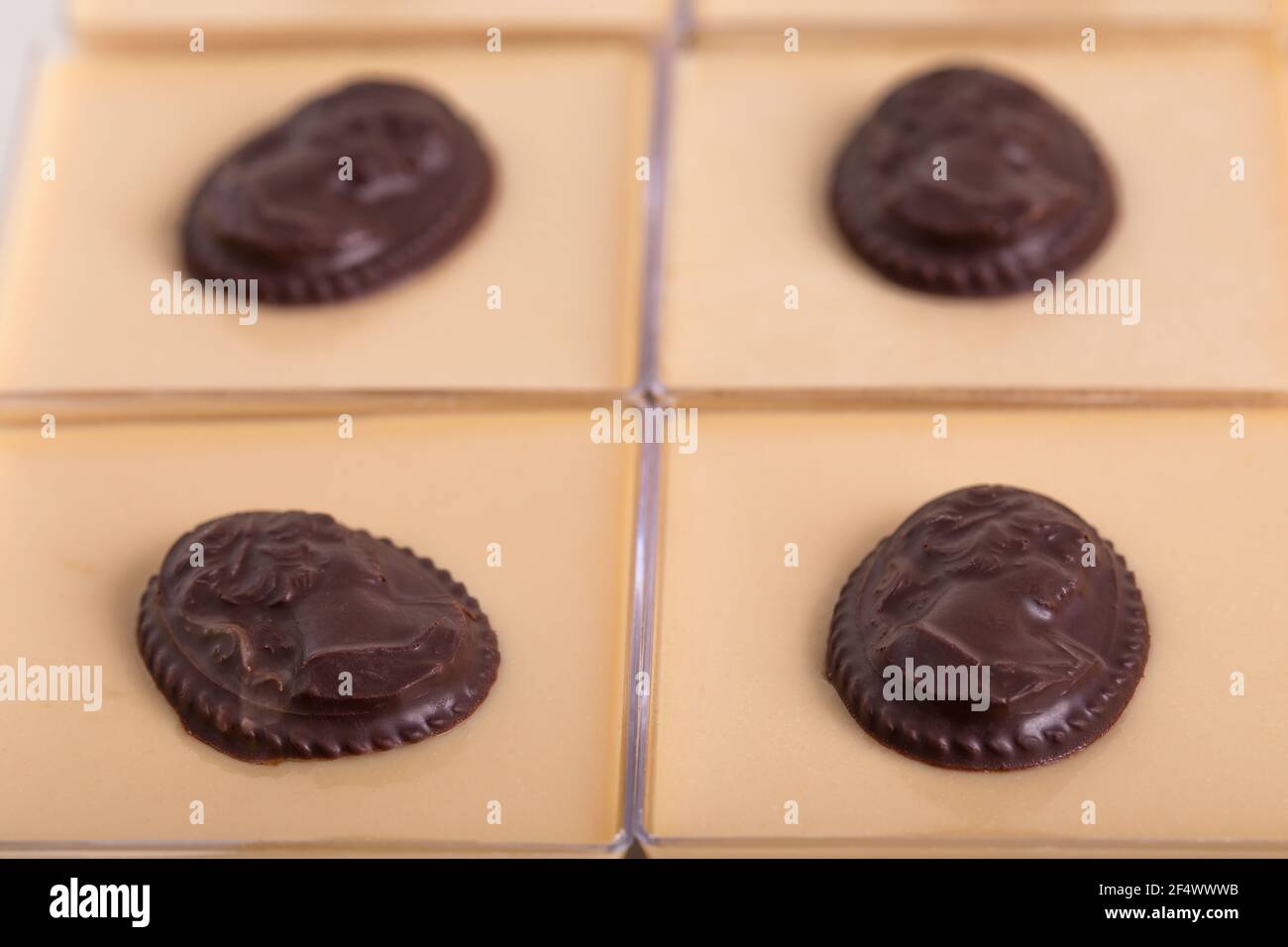 Delicious milk chocolate desserts with dark chocolate portrait candies ...