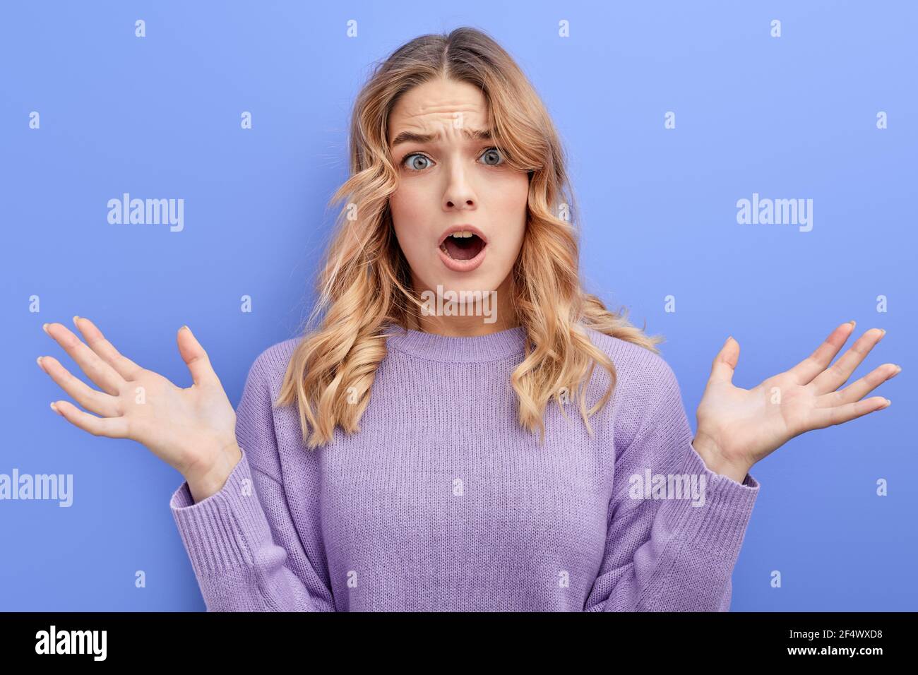 Portrait Of Attractive Woman With Open Mouth Making Crazy Astonished