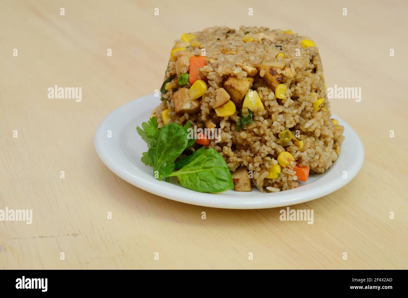 A eating fried rice plate Stock Photo - Alamy