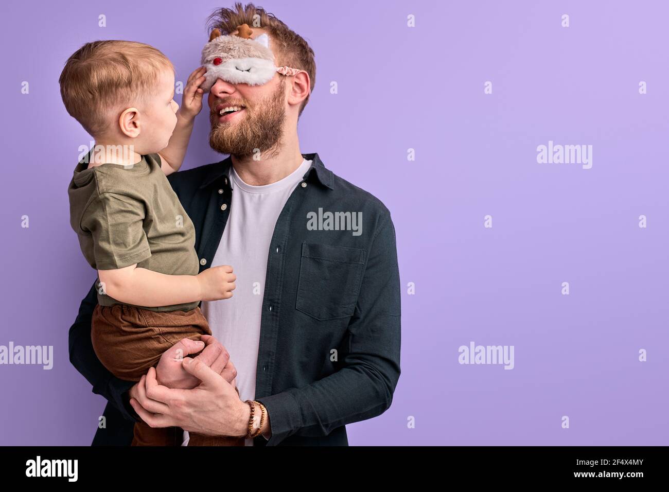 dad in eye mask for sleep doesn't want to take the child to ...