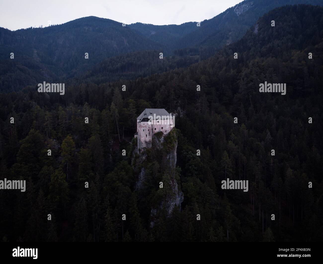 Aerial panorama view of isolated idyllic medieval historic stone rock ...