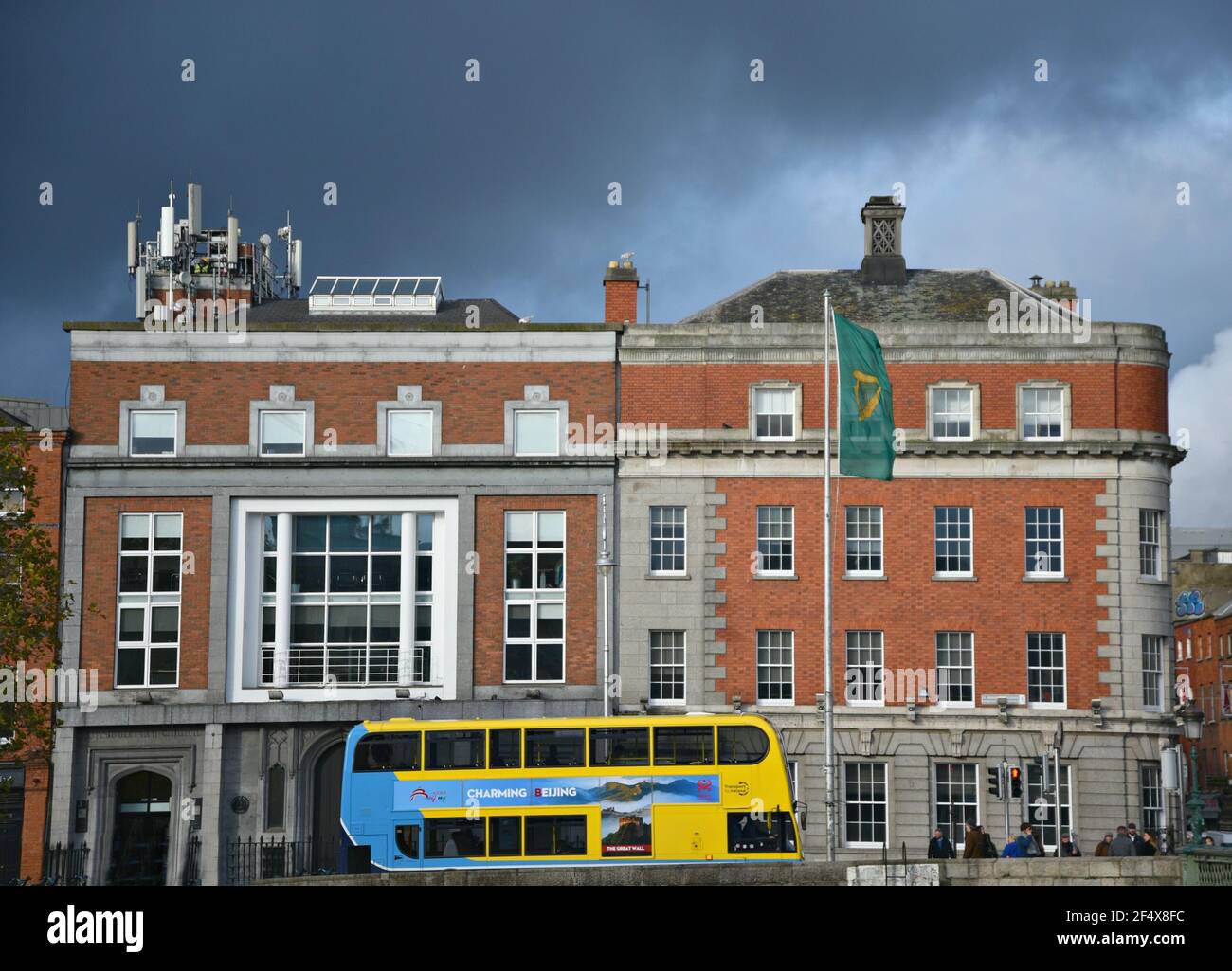 Facade view of a commercial brick building with a colorful Double ...