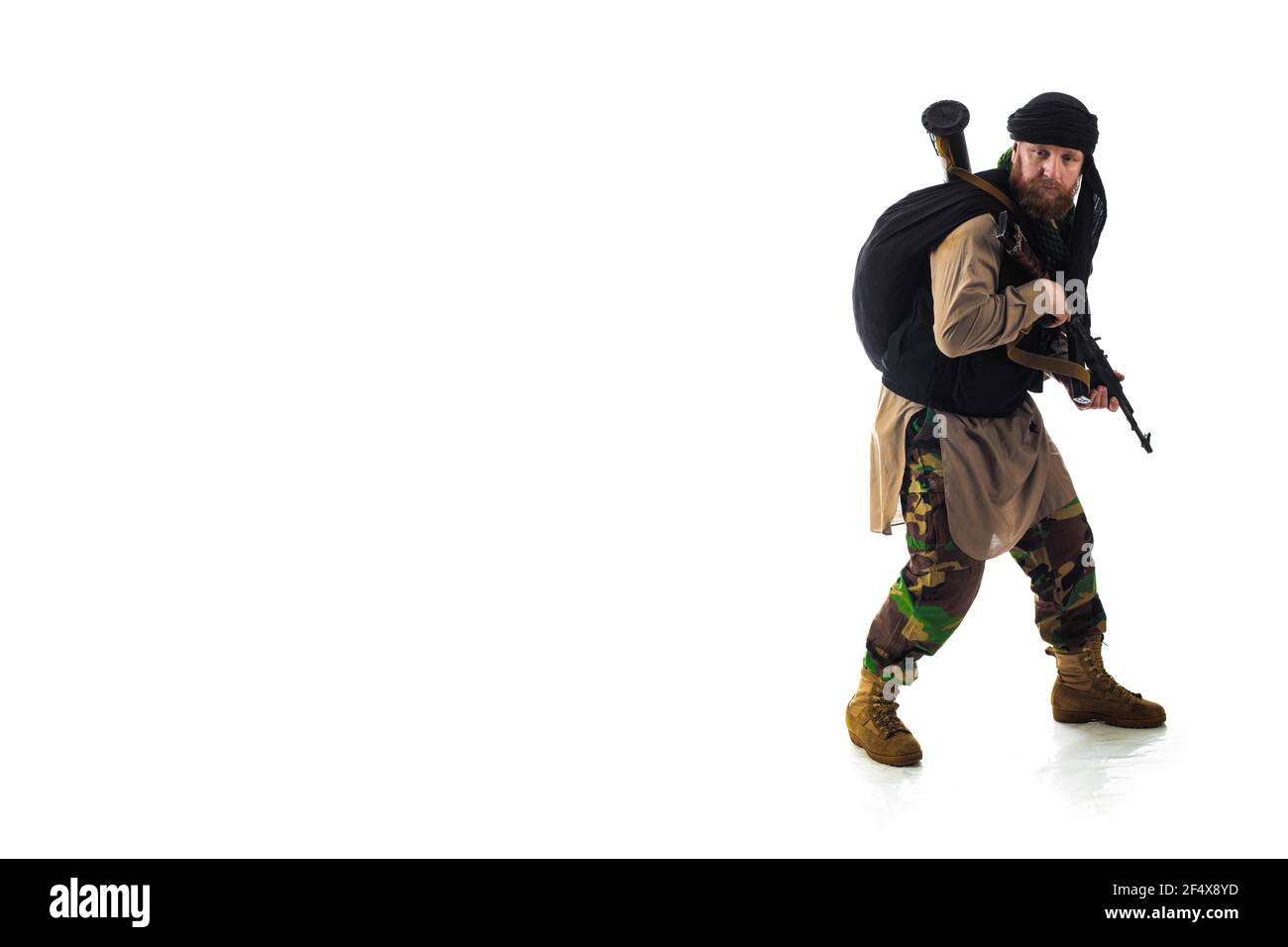 man in military outfit warrior Mujahedin in modern times on a white ...