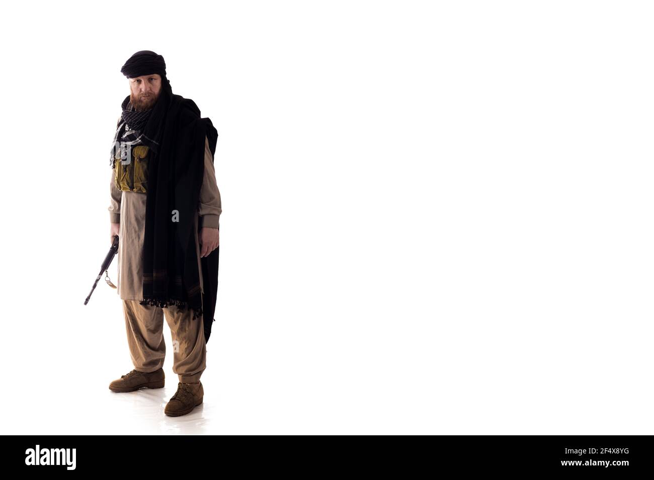 man in military outfit warrior Mujahedin in modern times on a white ...