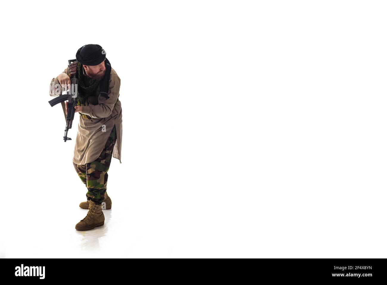 man in military outfit warrior Mujahedin in modern times on a white ...