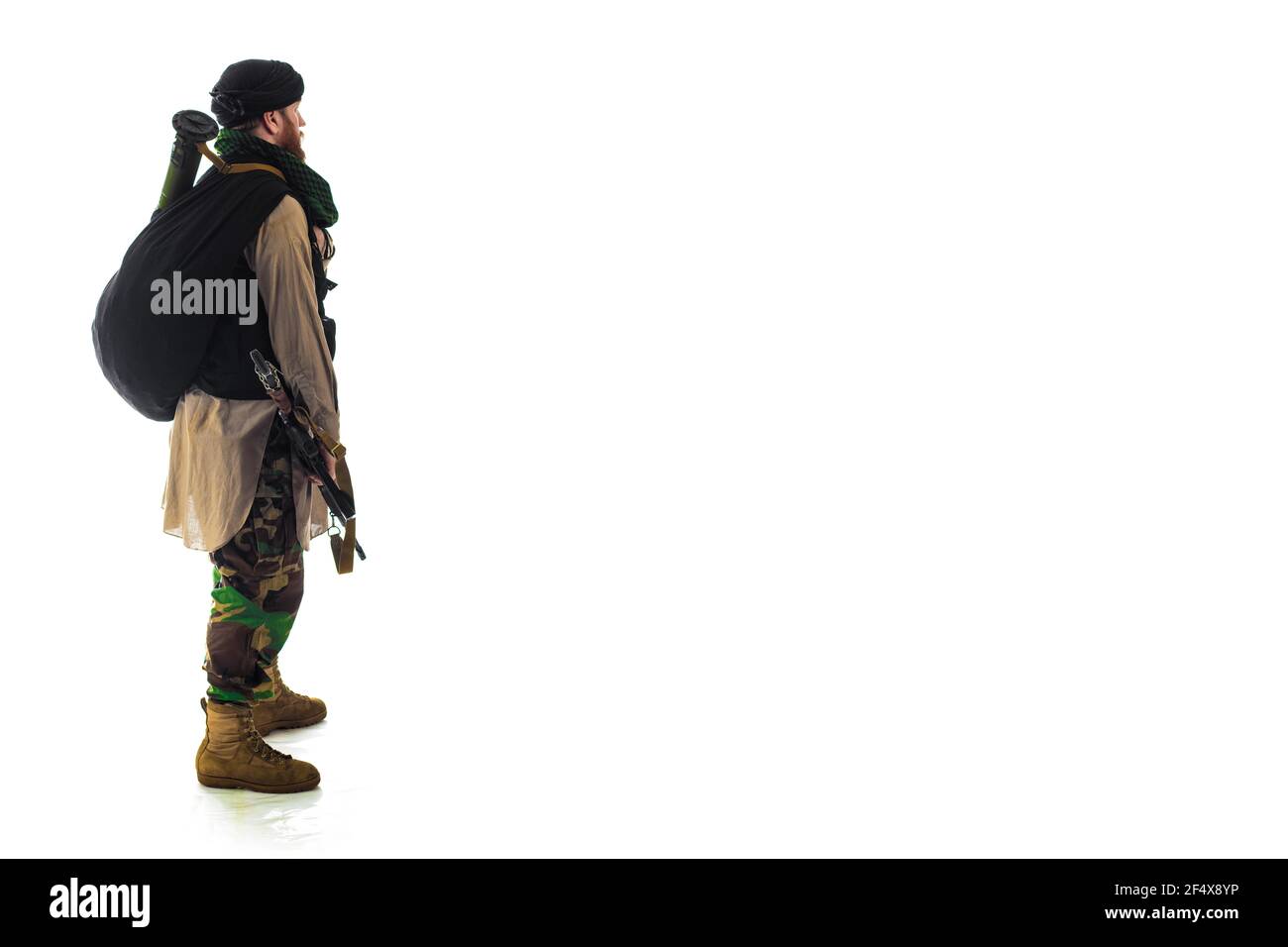 man in military outfit warrior Mujahedin in modern times on a white ...