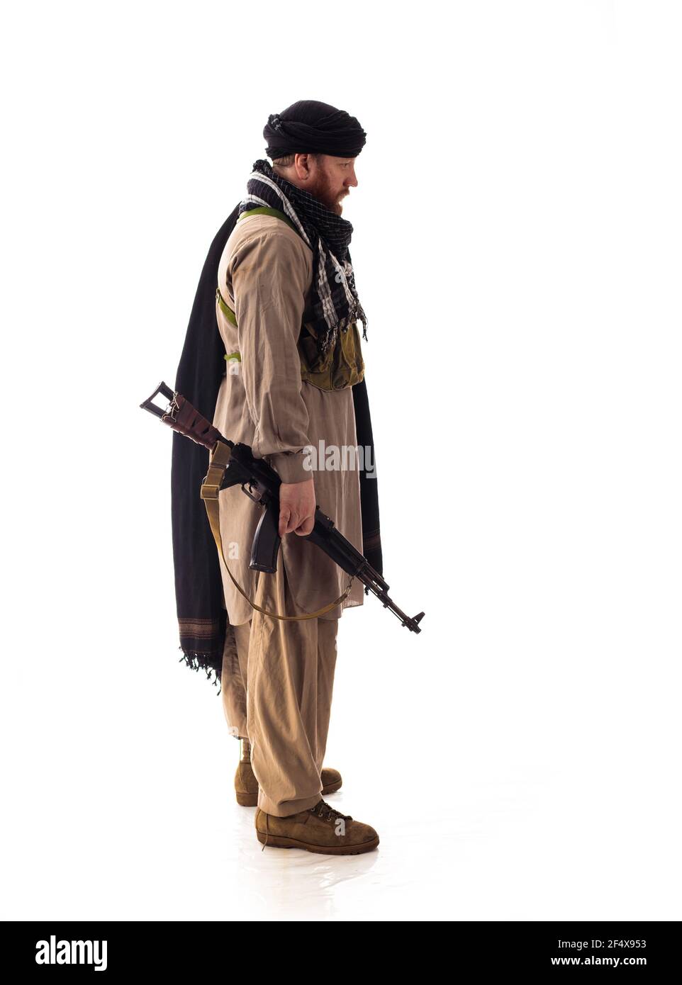 man in military outfit warrior Mujahedin in modern times on a white ...