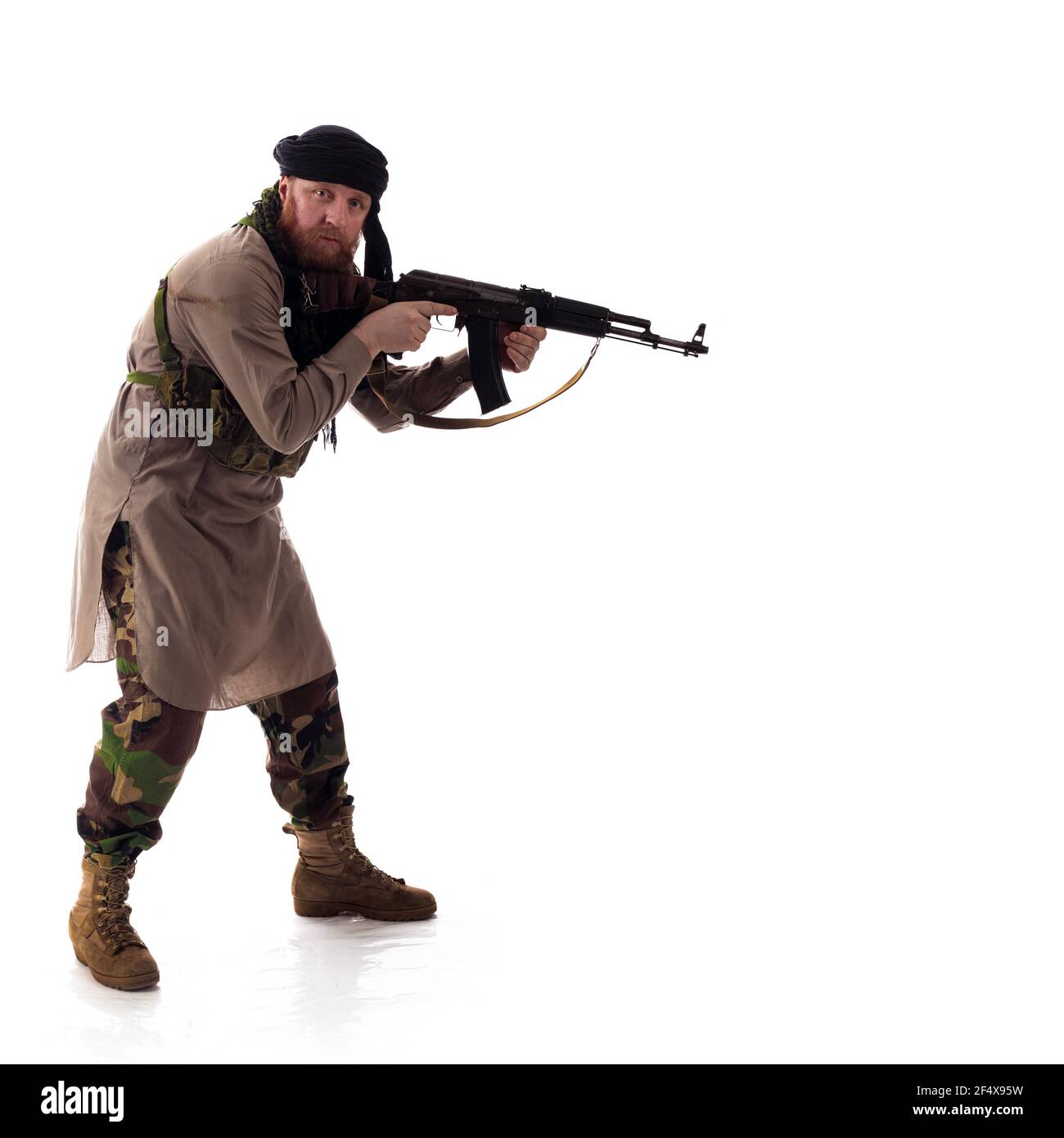 man in military outfit warrior Mujahedin in modern times on a white ...