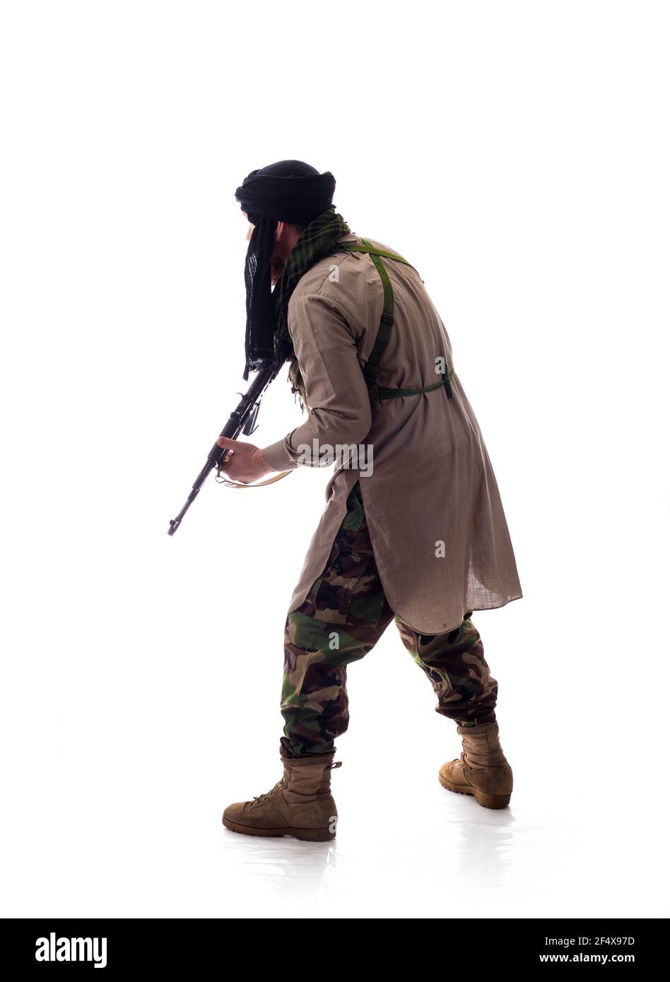 man in military outfit warrior Mujahedin in modern times on a white ...