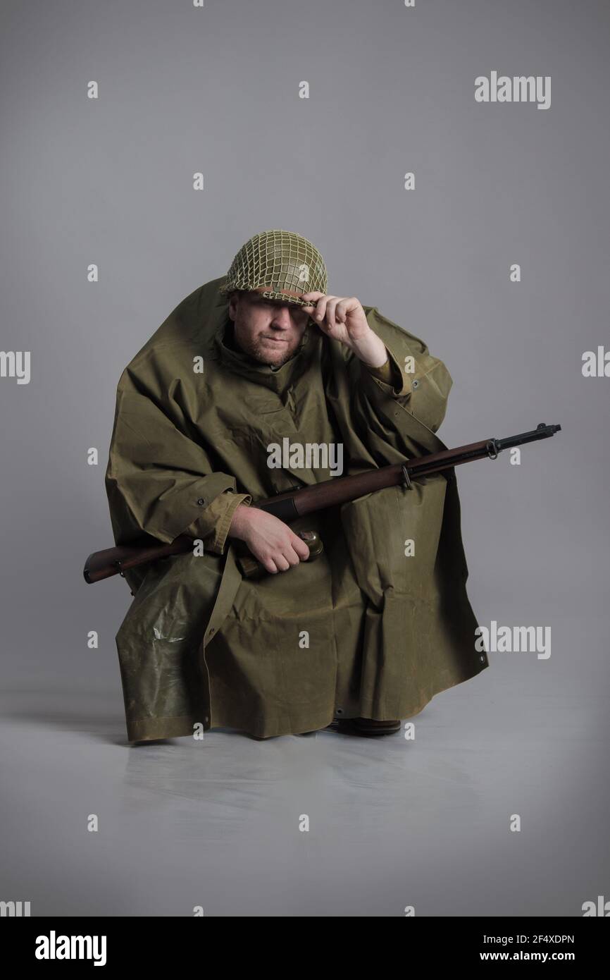 Posing uniform rifle flag hi-res stock photography and images - Alamy