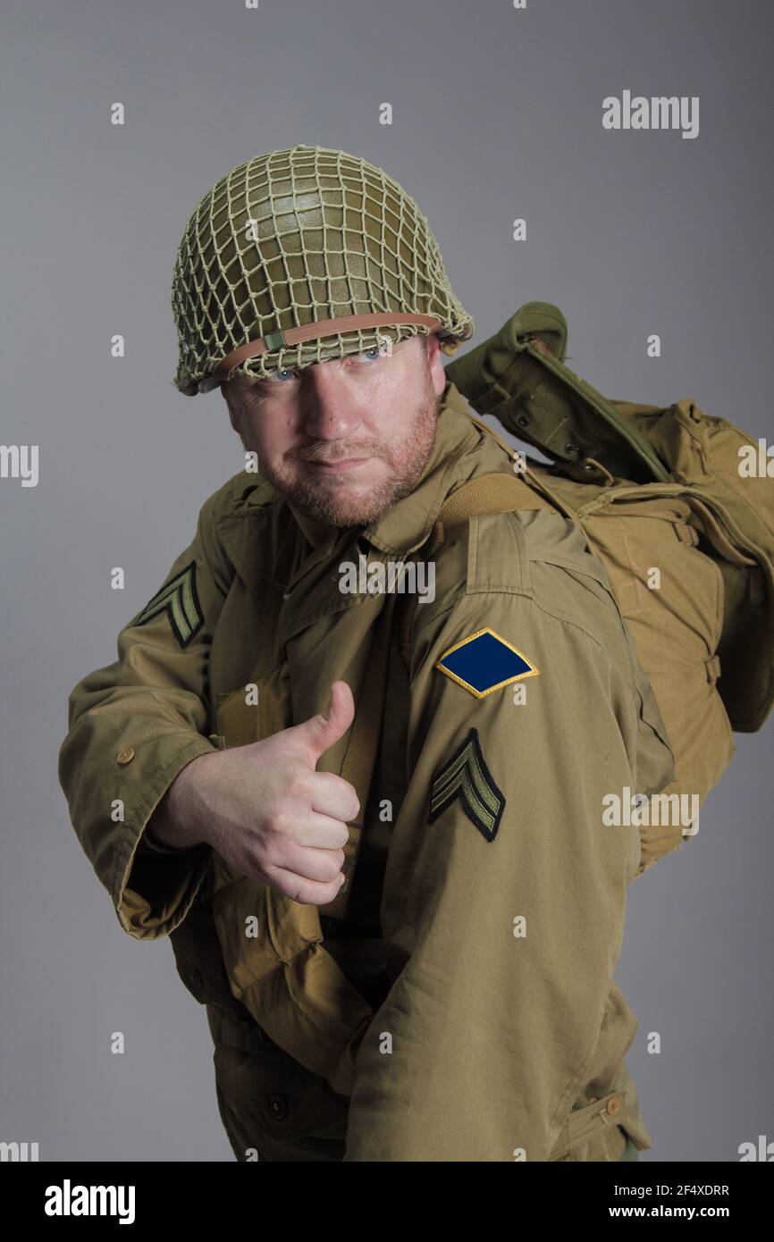 Posing uniform rifle flag hi-res stock photography and images - Alamy