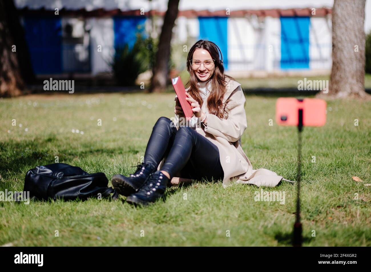 young woman online learning on mobile internet outdoors Stock Photo - Alamy