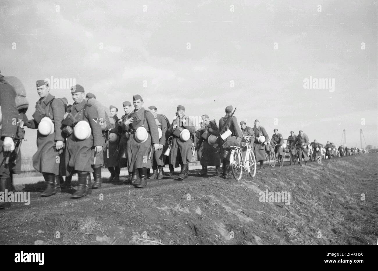 Second World War. Holland. March formation and cyclists of the German ...