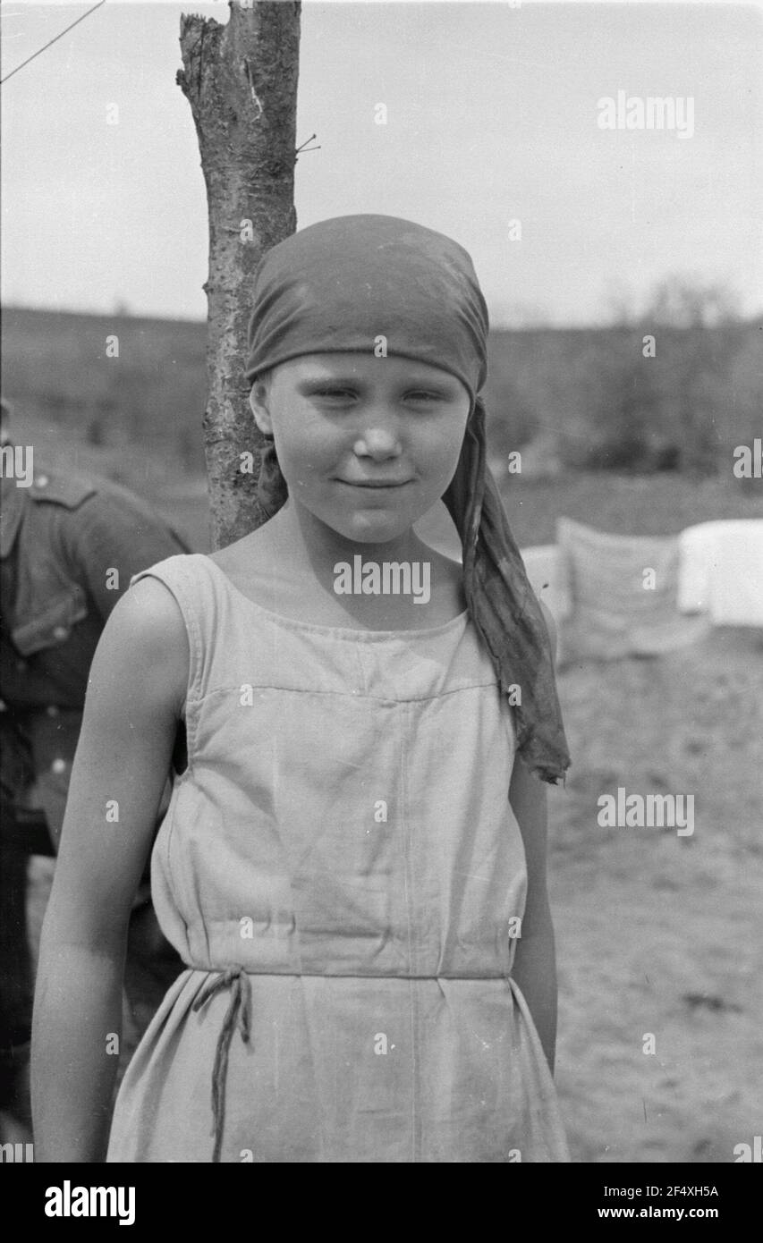 Second World War. For billeting. Soviet Union. Portrait of a girl (folk ...