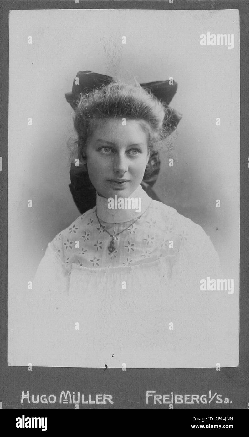 Young girl with big loop in the hair Stock Photo - Alamy