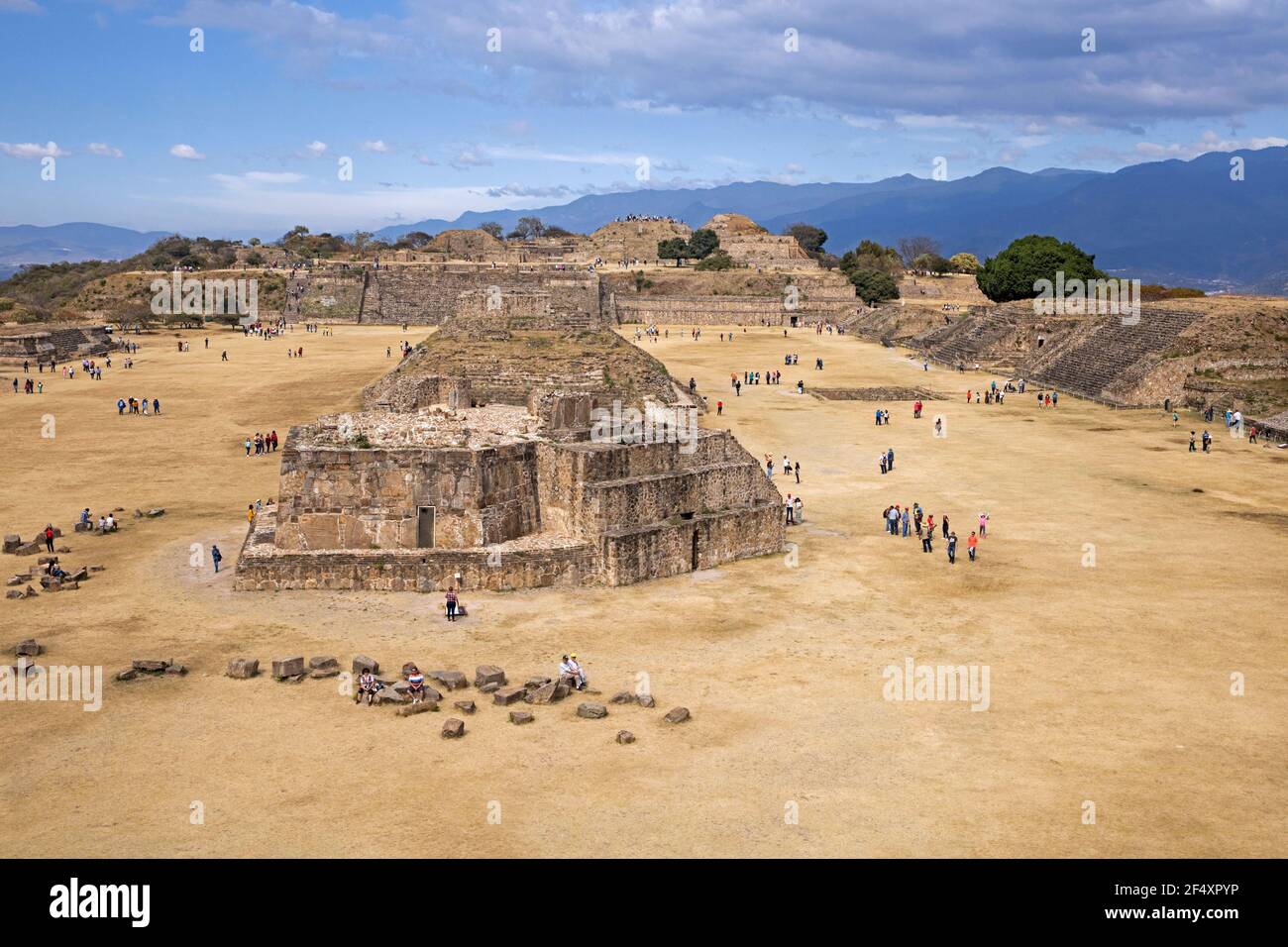 Tourists visiting the Monte Alban pyramid complex, pre-Columbian ...