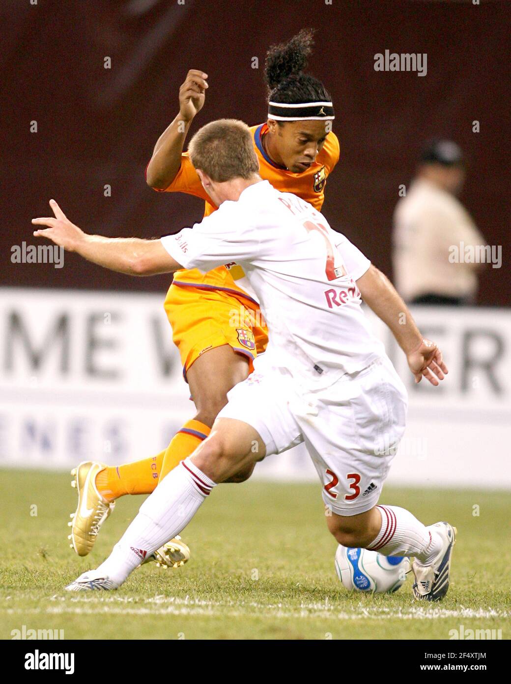 Ronaldinho sends Jeff Parke in the wrong direction. FC Barcelona ...