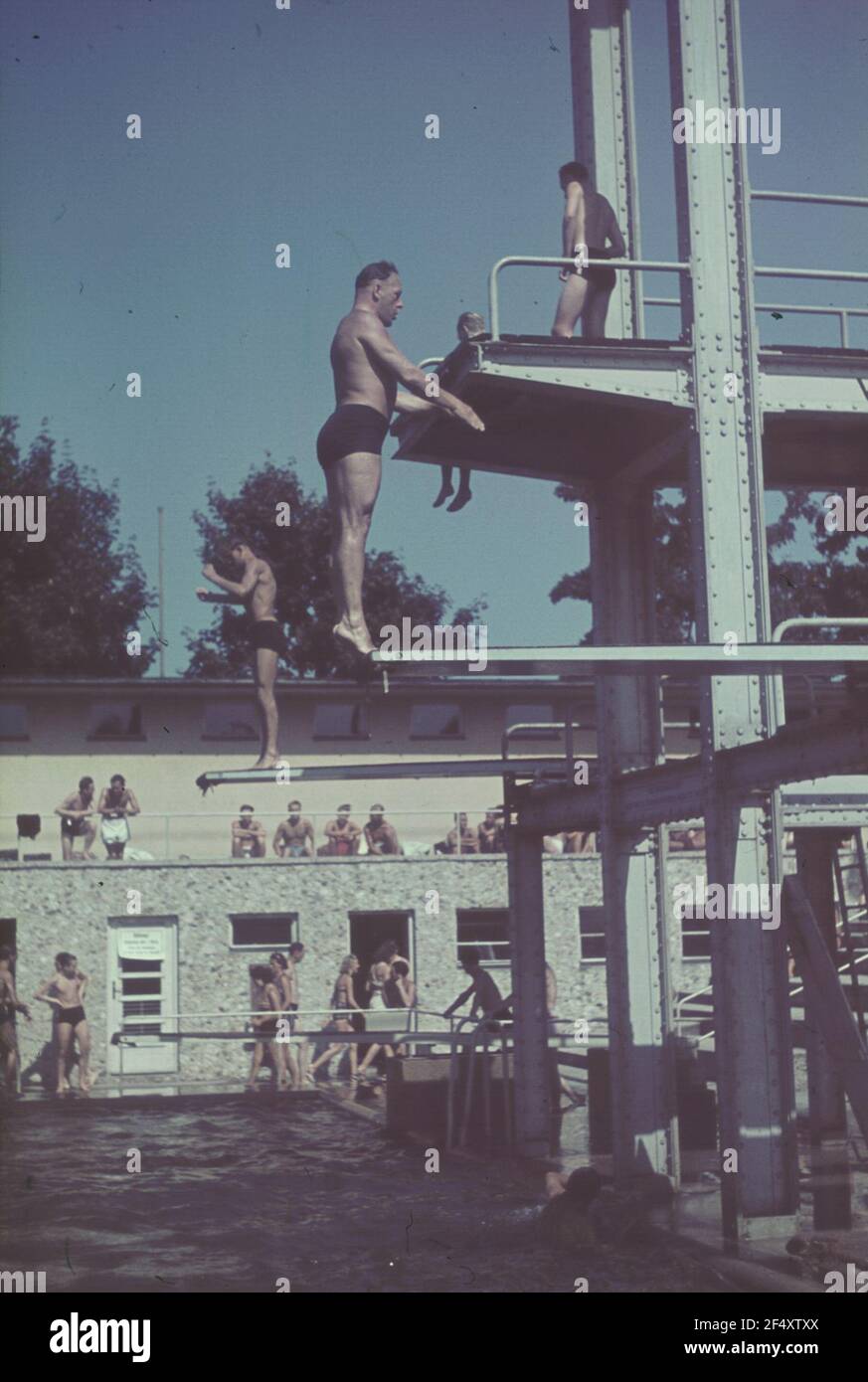 Germany. Outdoor pool with 10 m jump tower (10 m board). View with ...