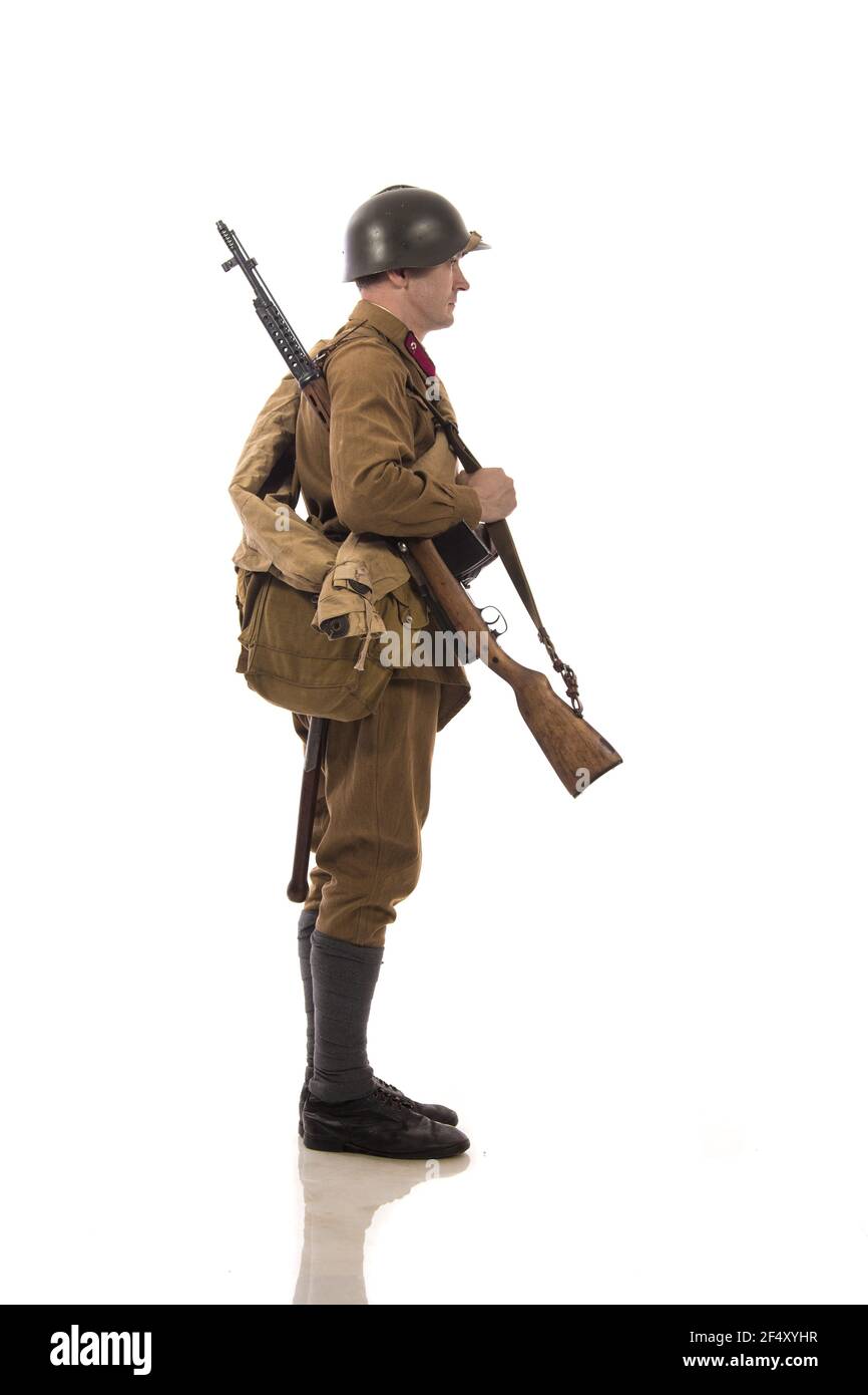 Male actor in uniform and helmet of ordinary soldiers of the Russian ...