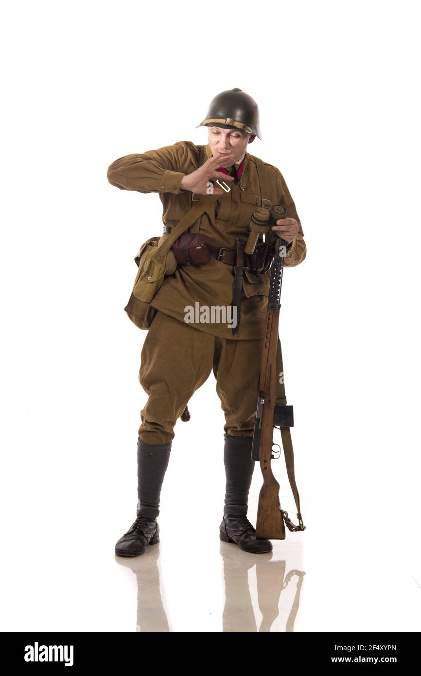 Male actor in uniform and helmet of ordinary soldiers of the Russian ...