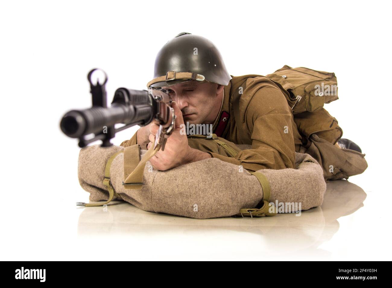 Male actor in uniform and helmet of ordinary soldiers of the Russian ...