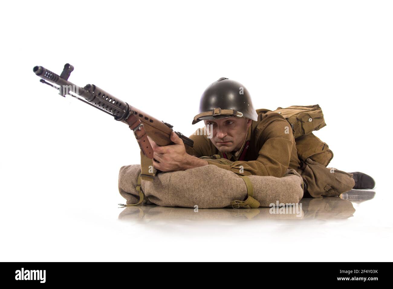 Male actor in uniform and helmet of ordinary soldiers of the Russian ...