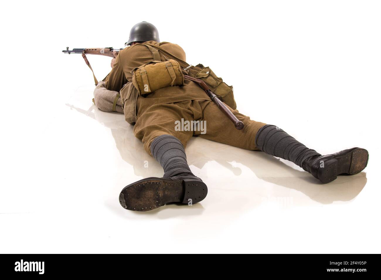 Male actor in uniform and helmet of ordinary soldiers of the Russian ...