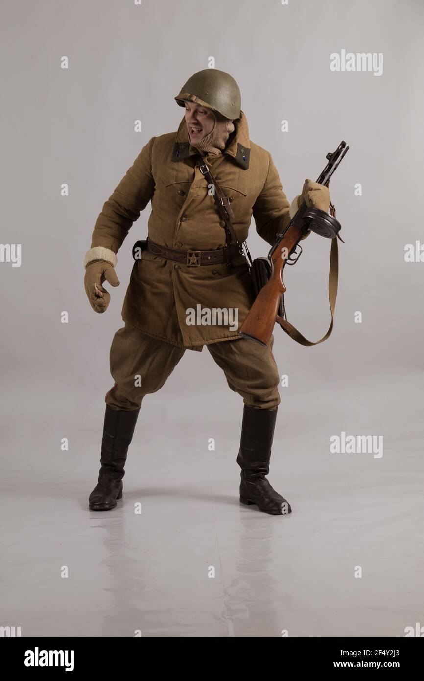 male actor in the winter military uniform of an officer of the Red Army ...