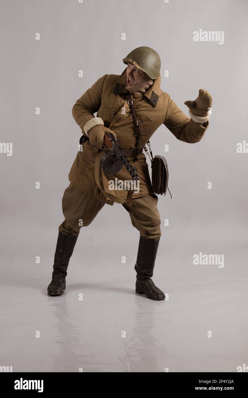 male actor in the winter military uniform of an officer of the Red Army ...