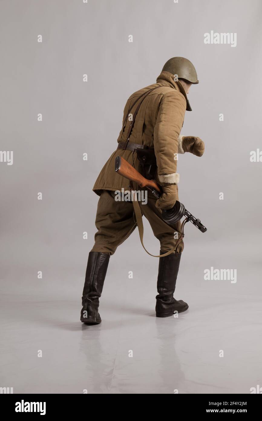 male actor in the winter military uniform of an officer of the Red Army ...