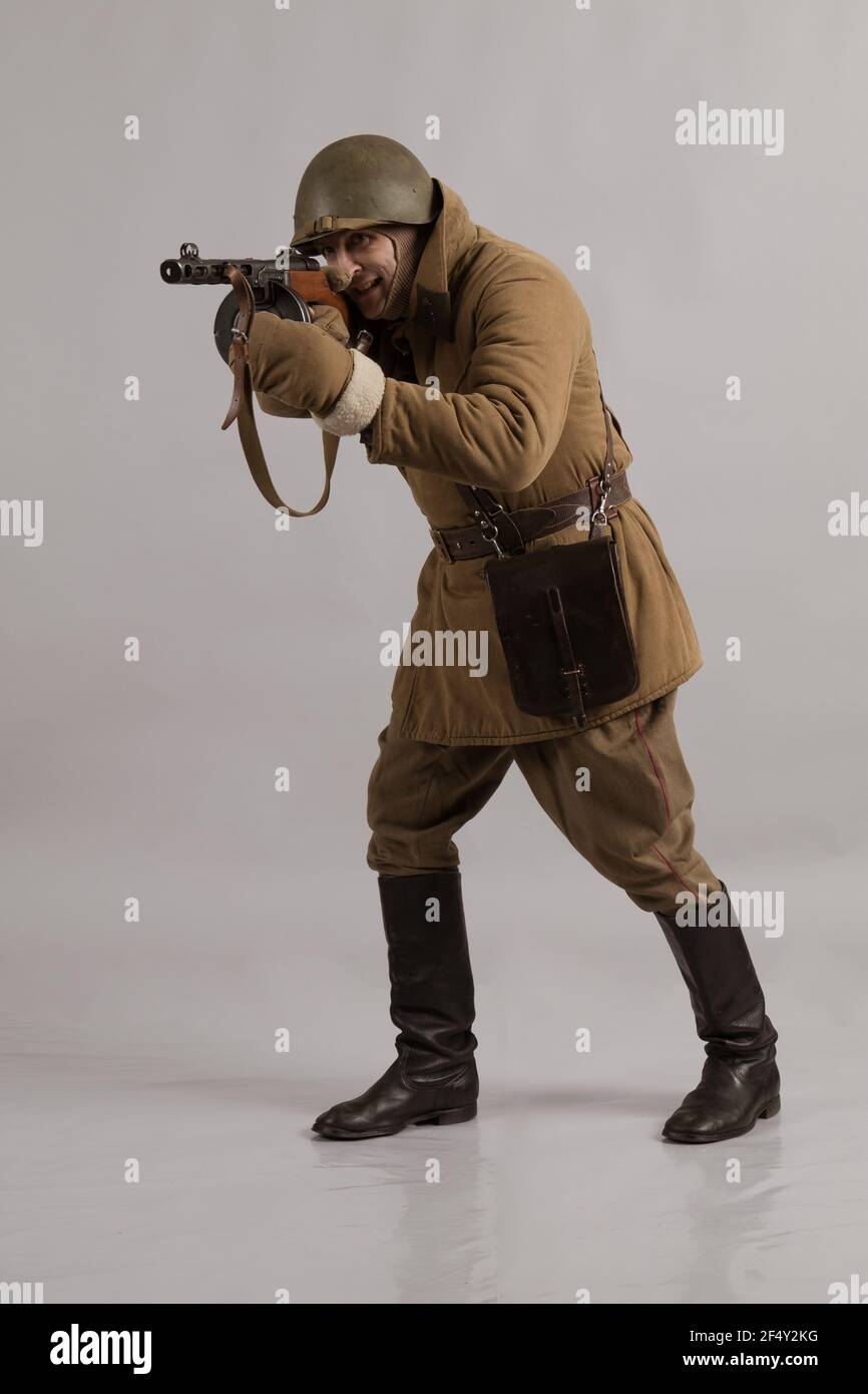 male actor in the winter military uniform of an officer of the Red Army ...