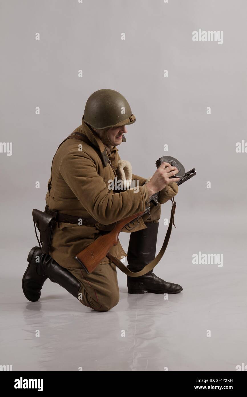 male actor in the winter military uniform of an officer of the Red Army ...