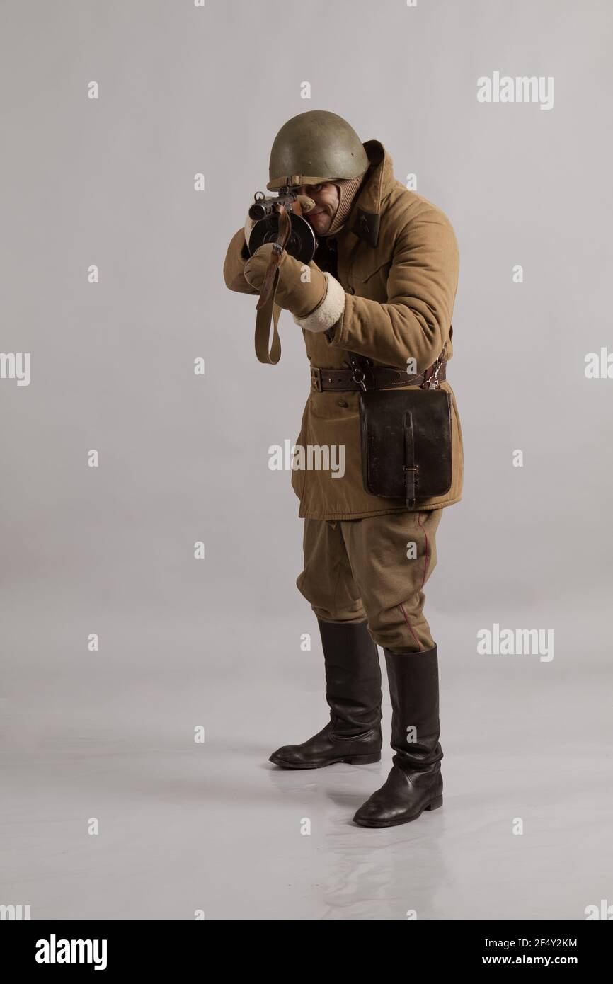 male actor in the winter military uniform of an officer of the Red Army ...
