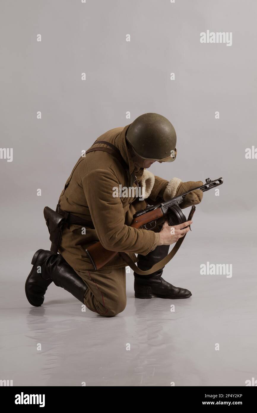 male actor in the winter military uniform of an officer of the Red Army ...
