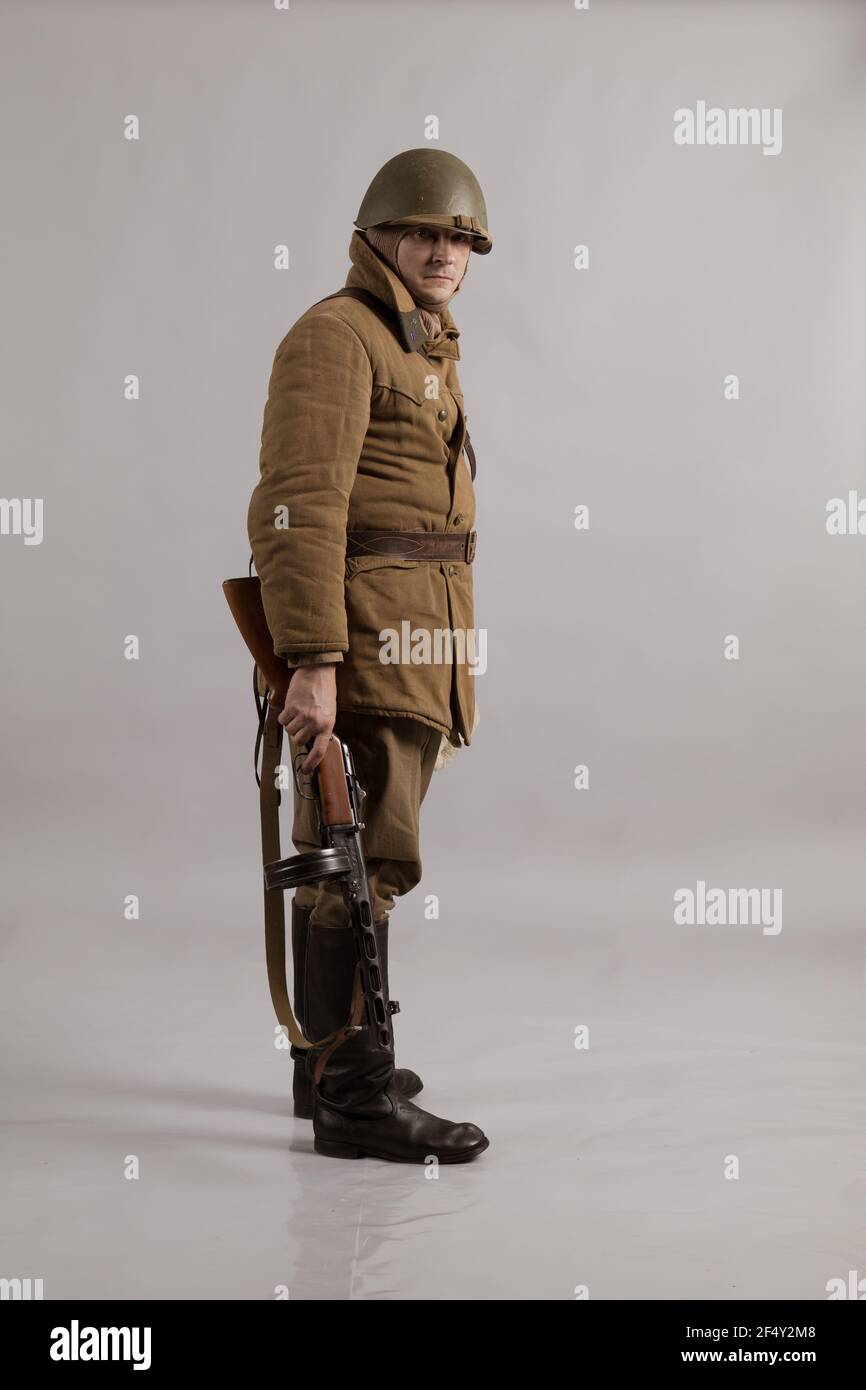 male actor in the winter military uniform of an officer of the Red Army ...