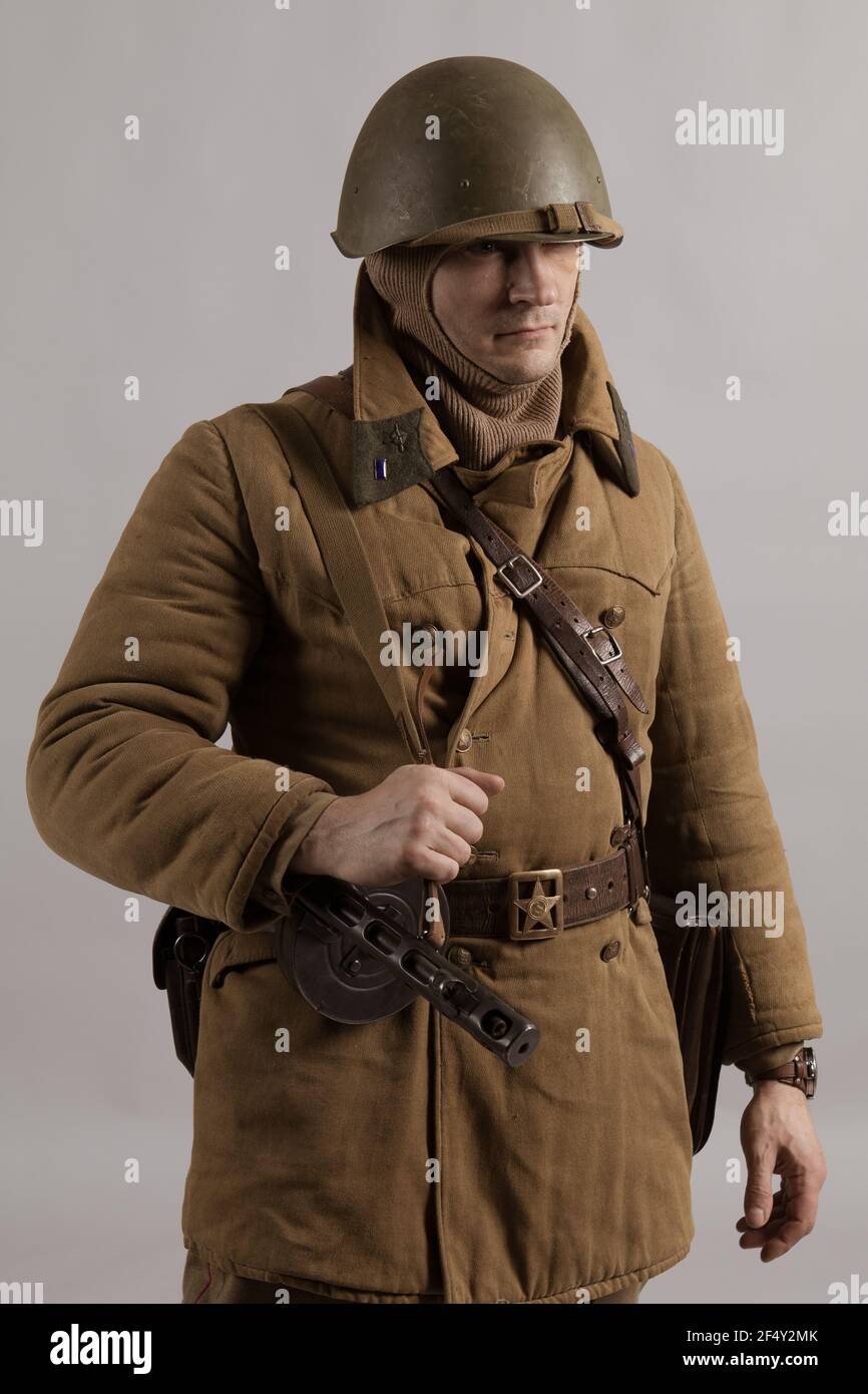 male actor in the winter military uniform of an officer of the Red Army ...