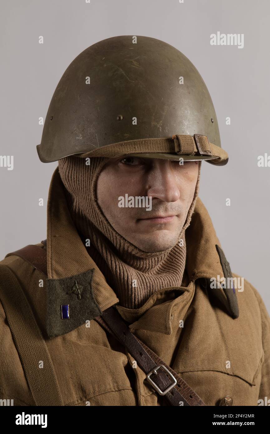male actor in the winter military uniform of an officer of the Red Army ...