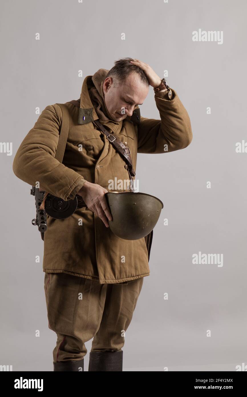 male actor in the winter military uniform of an officer of the Red Army ...