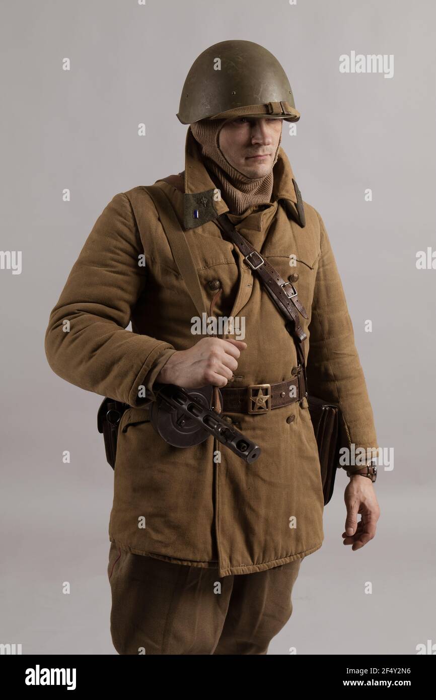 male actor in the winter military uniform of an officer of the Red Army ...