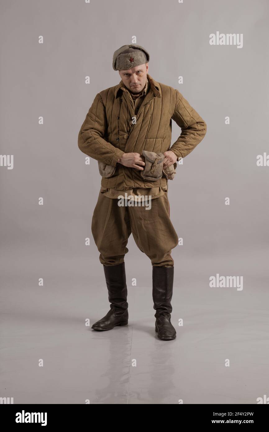male actor in the winter military uniform of an officer of the Red Army ...